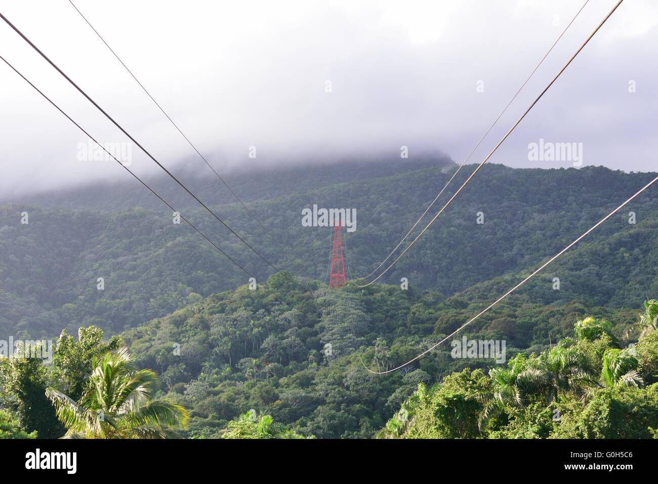 Cable car structure heading up to hills Stock Photo - Alamy