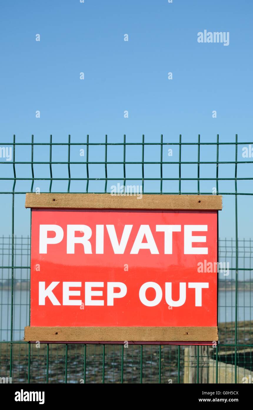 Metal gate with red sign hi-res stock photography and images - Alamy