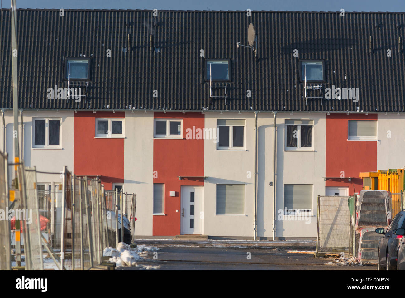 Row houses in a development area Stock Photo - Alamy