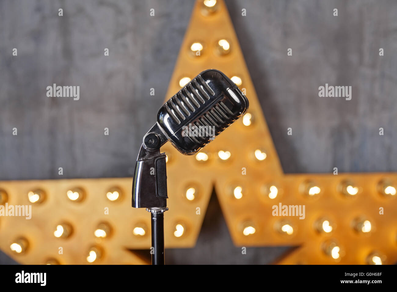 Vintage microphone in studio with star Stock Photo - Alamy