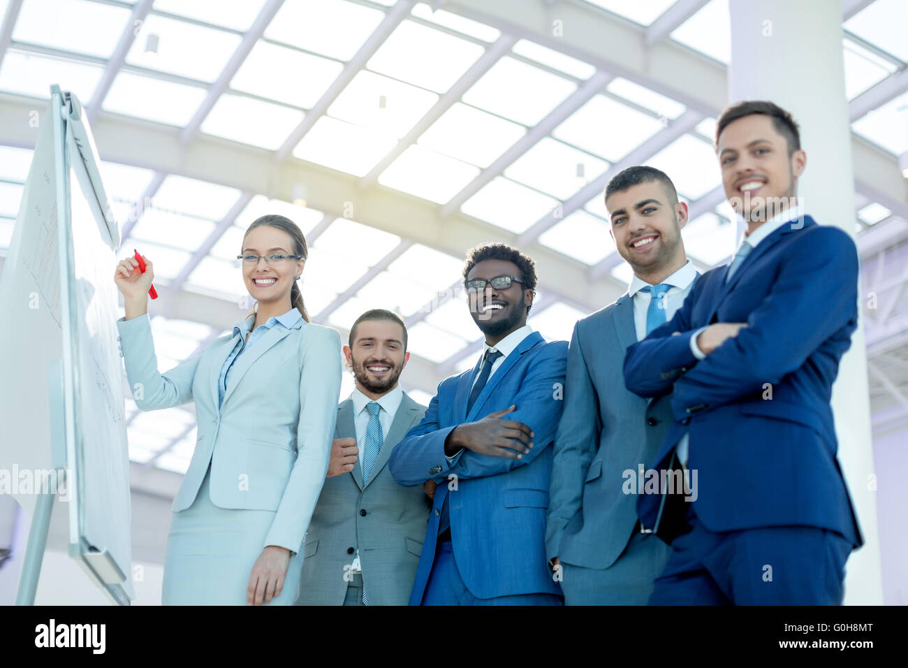 People with board Stock Photo - Alamy