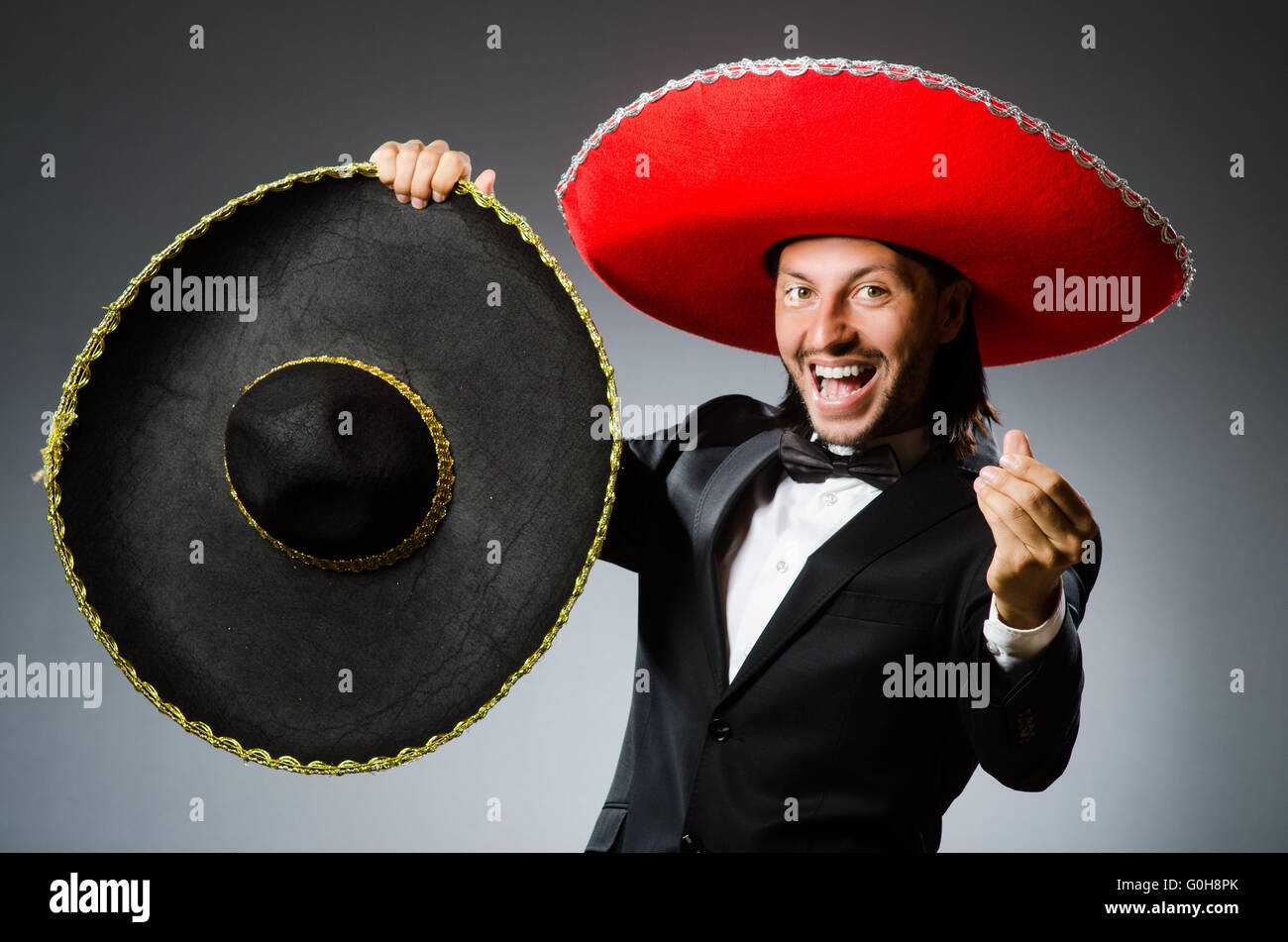 Young mexican man wearing sombrero Stock Photo - Alamy