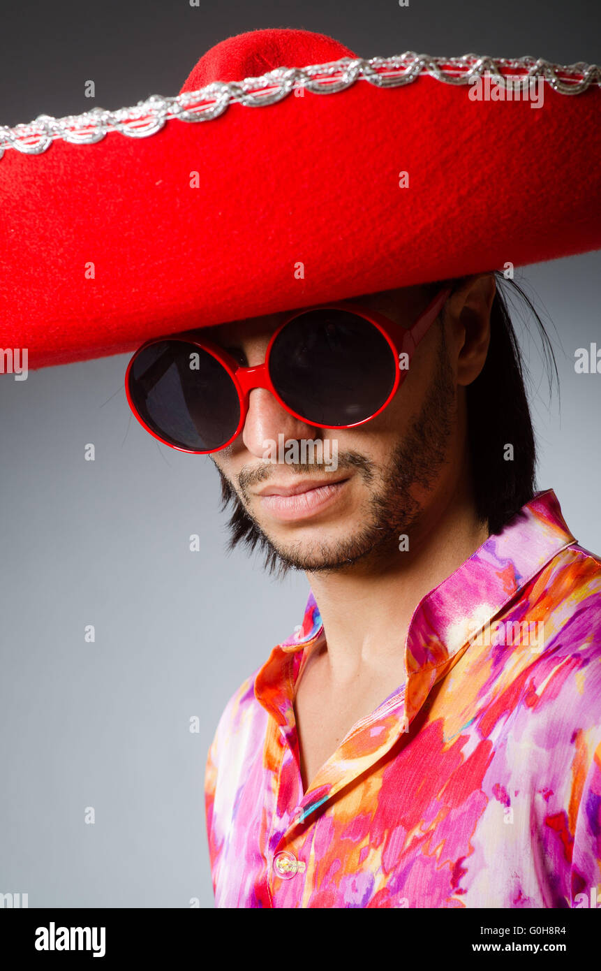 Young mexican man wearing sombrero Stock Photo - Alamy