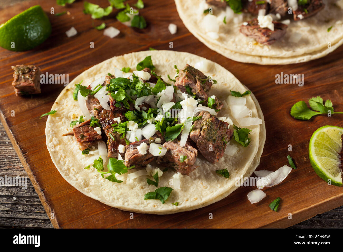 Homemade Carne Asada Street Tacos with Cheese Cilantro and Onion Stock ...