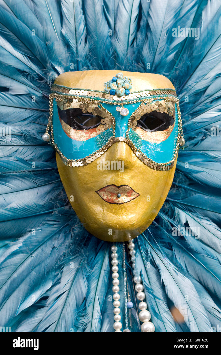 Venetian mask with feathers display Stock Photo - Alamy