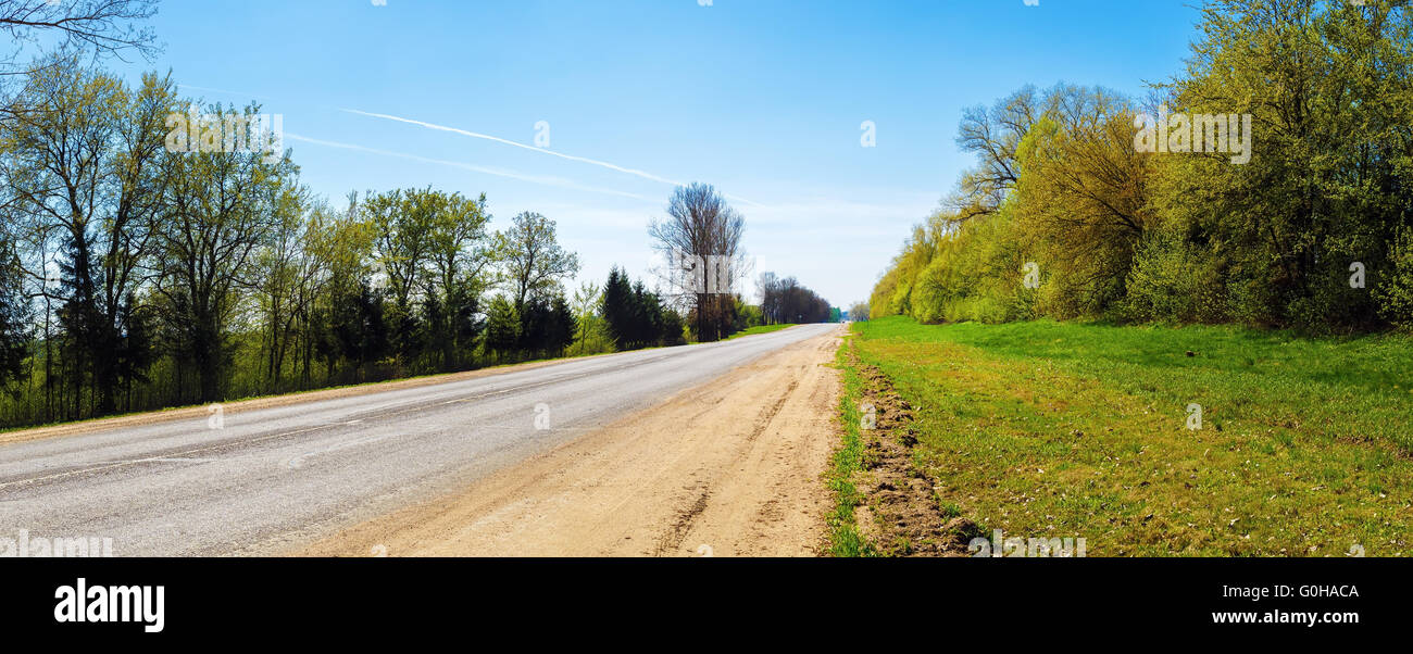 Asphalt road and trees Stock Photo - Alamy