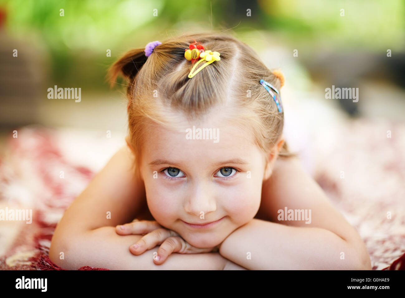 Resting baby girl Stock Photo - Alamy