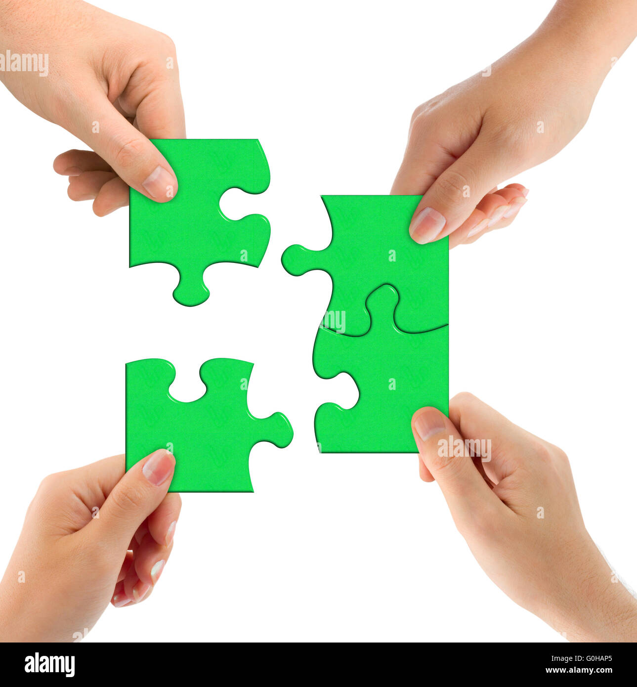 Hands and puzzle Stock Photo - Alamy
