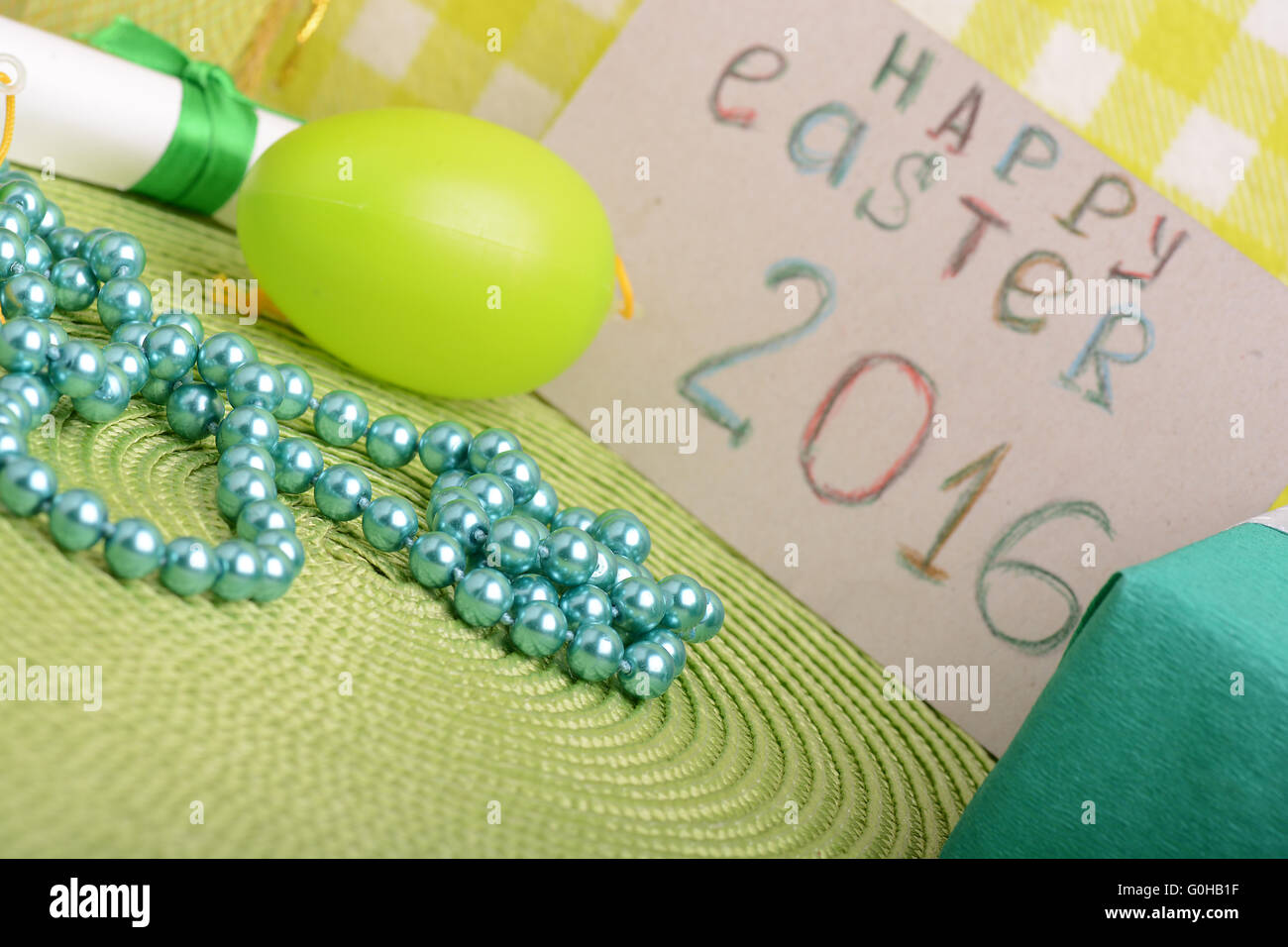 Easter eggs and invitation note. happy easter Stock Photo - Alamy