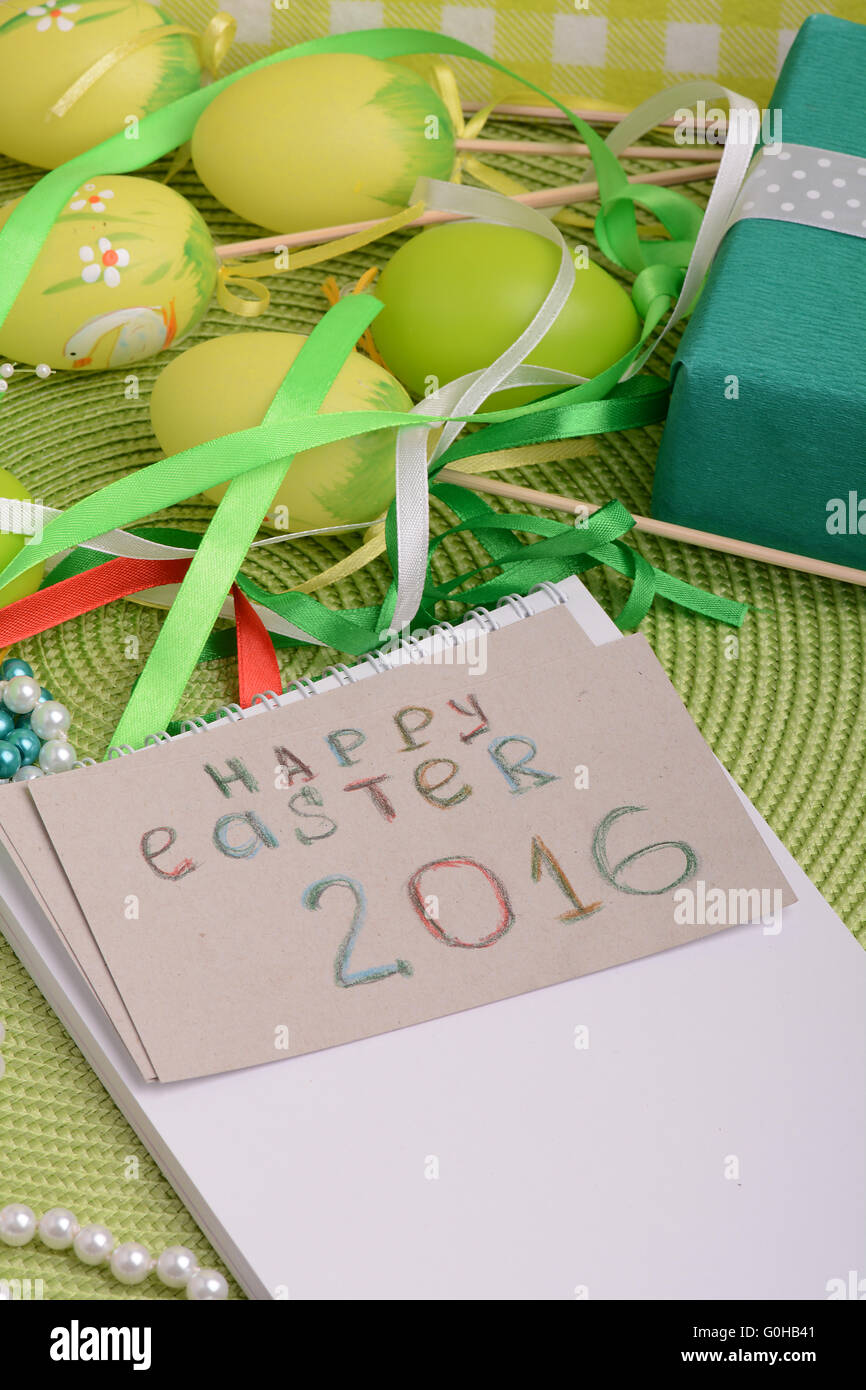 Easter eggs and invitation note. happy easter Stock Photo - Alamy