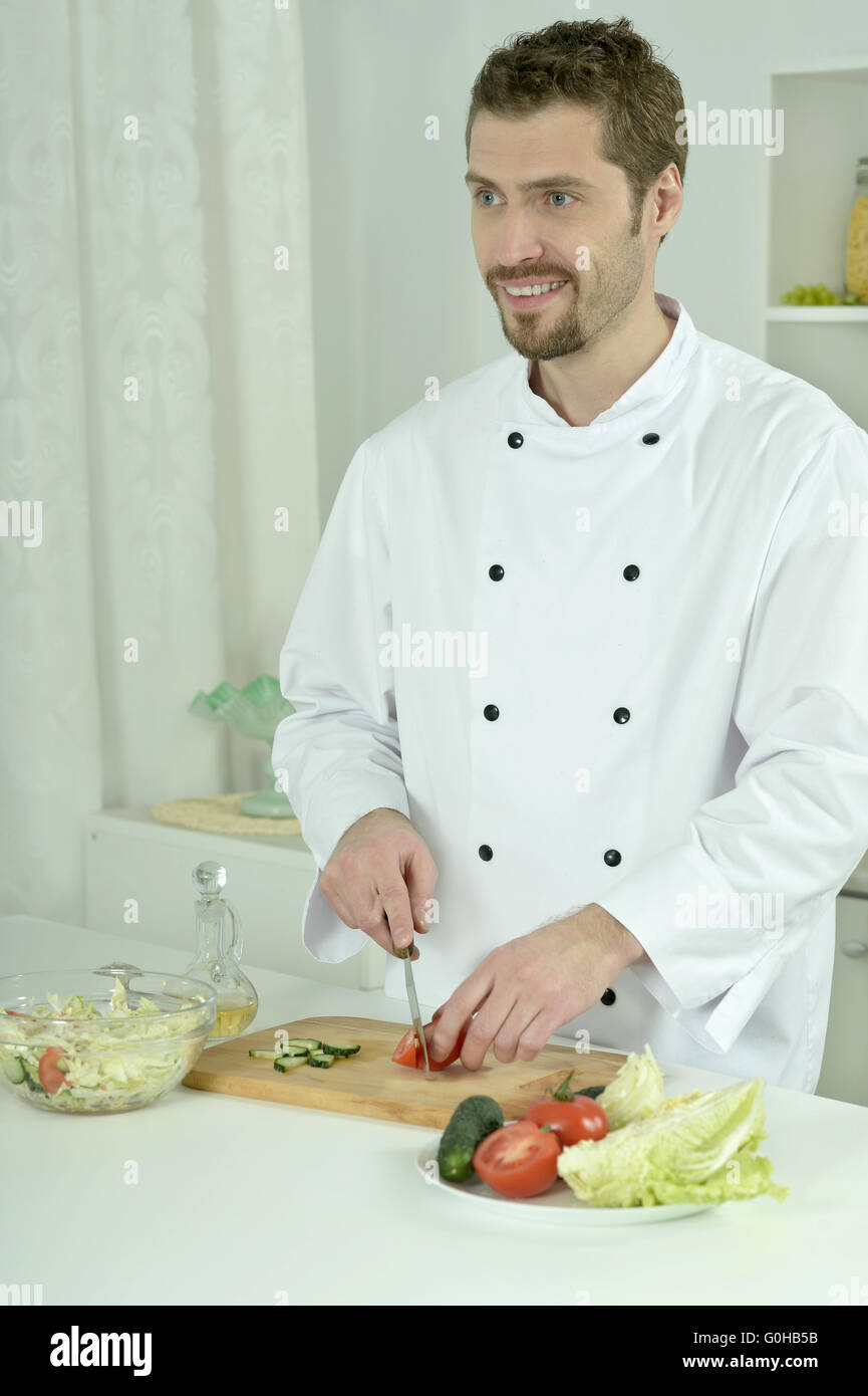 Man cooking in kitchen Stock Photo - Alamy