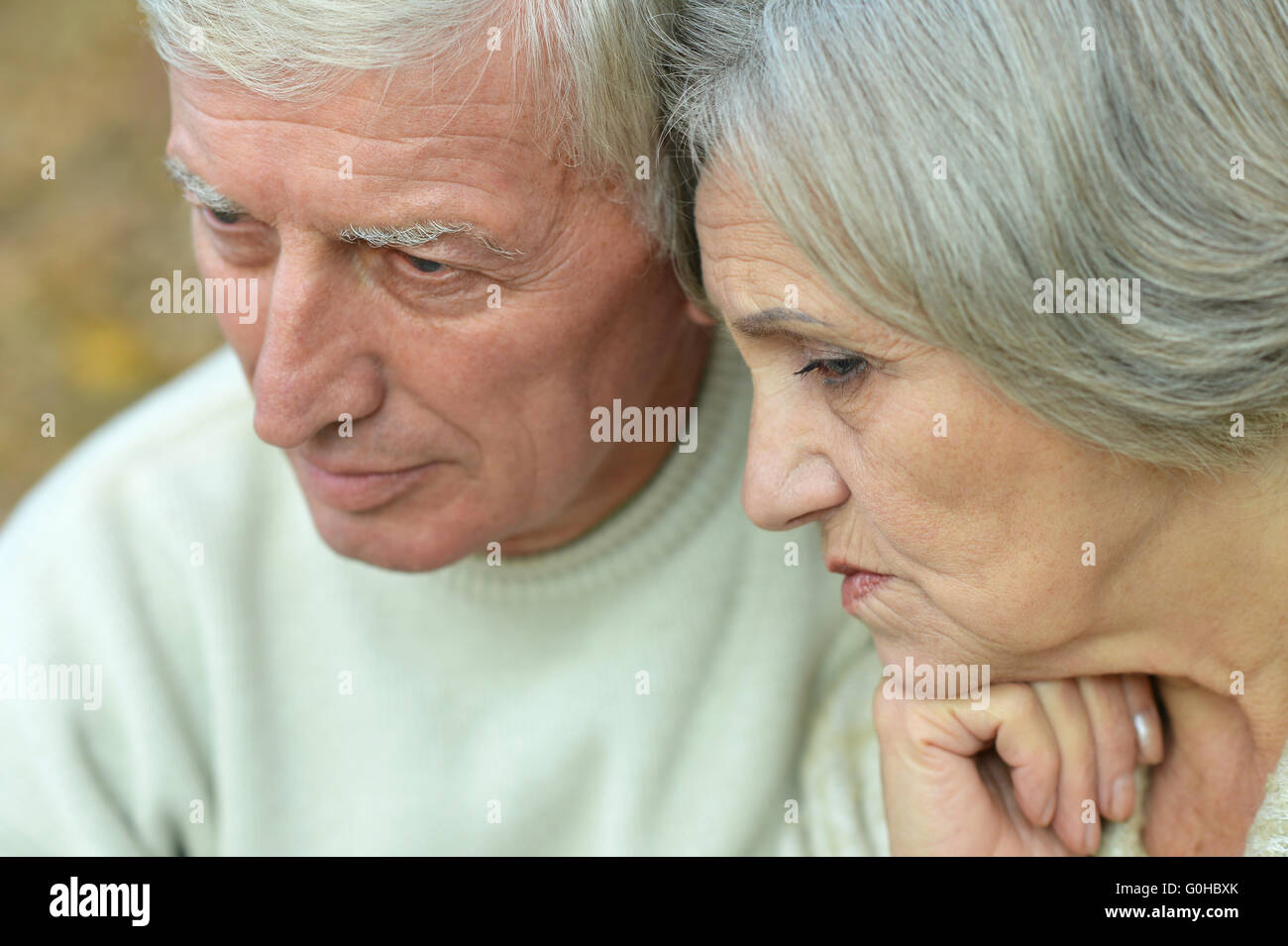 Sad senior couple Stock Photo - Alamy