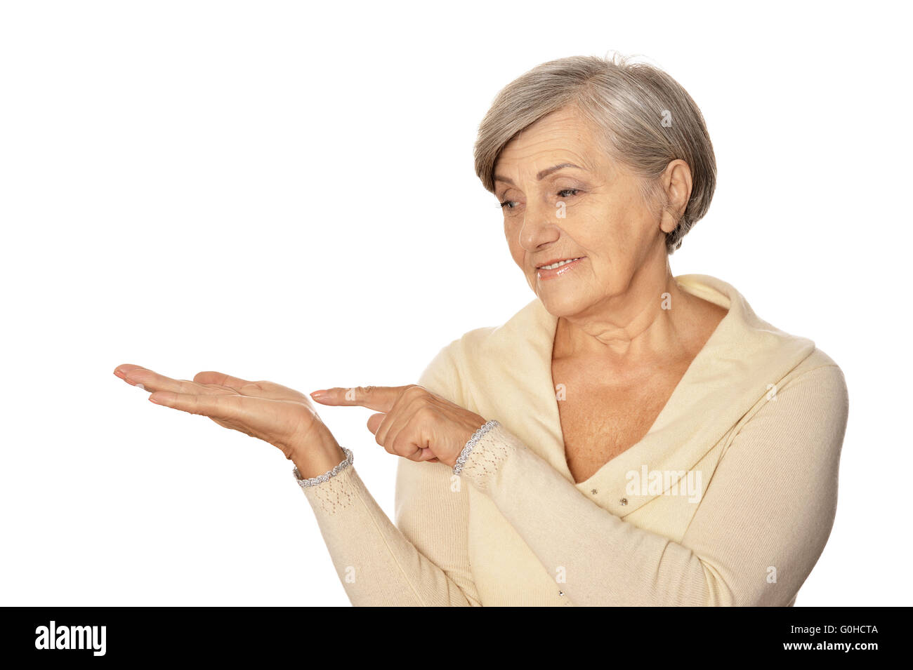 Senior lady pointing Stock Photo - Alamy