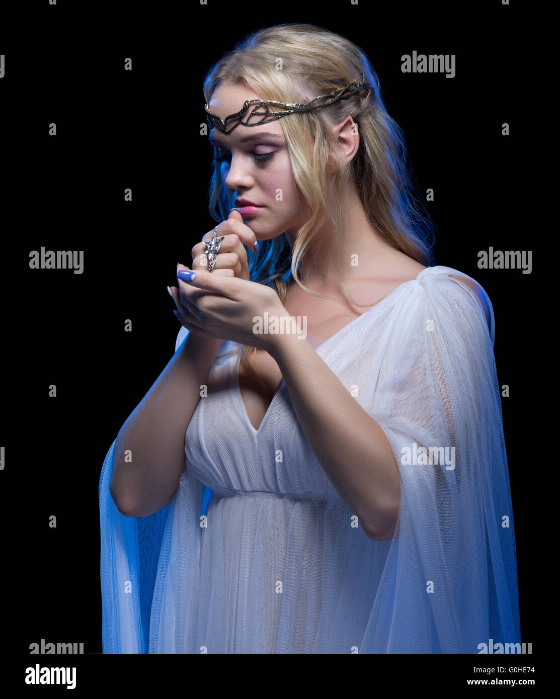 Young elven girl isolated on black Stock Photo - Alamy