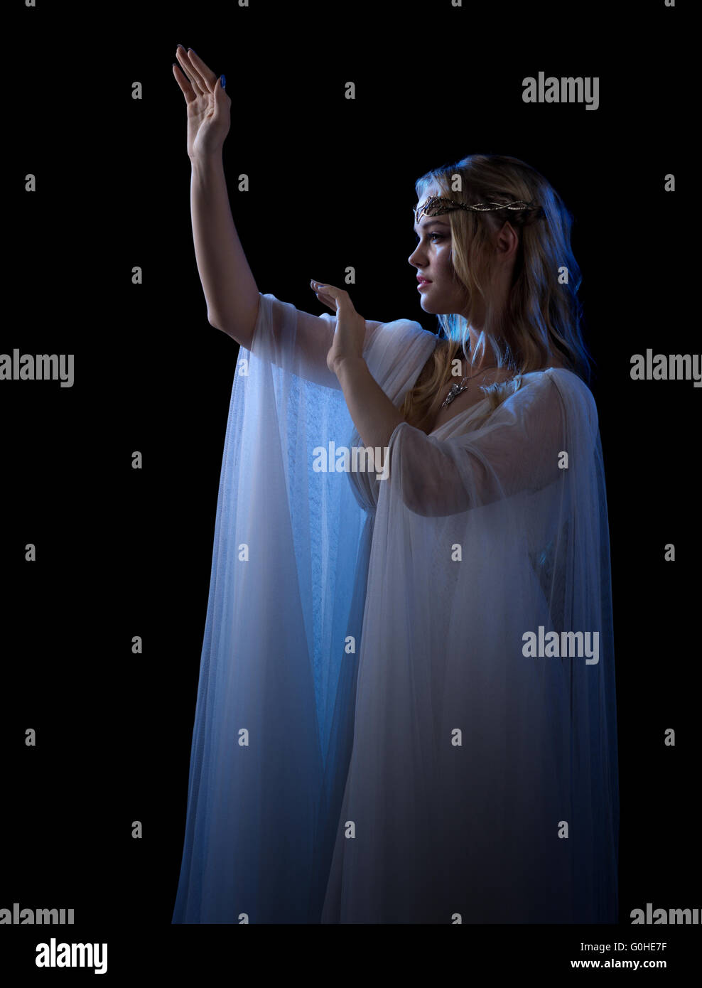 Young elven girl isolated on black Stock Photo - Alamy