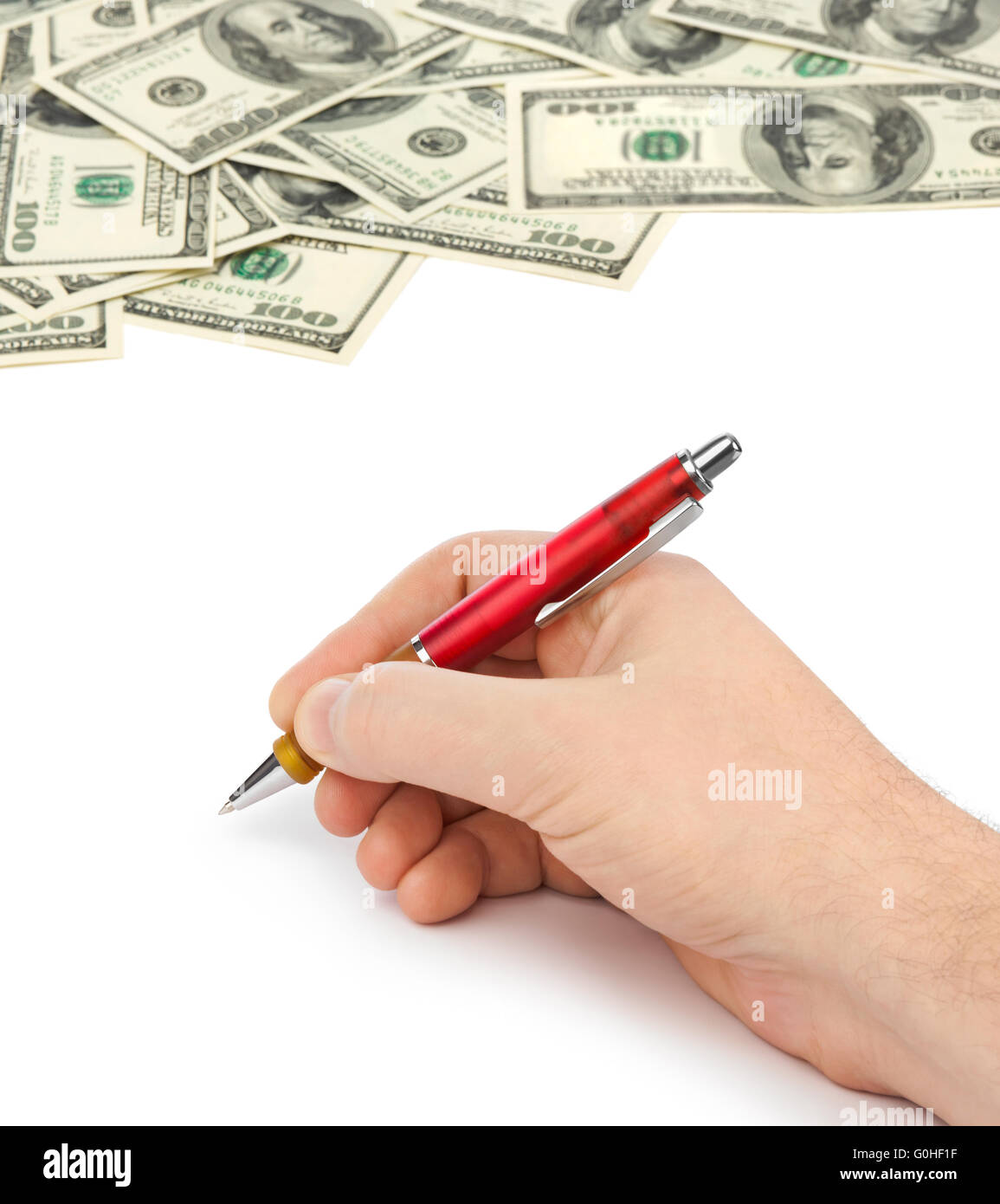 Hand with pen and money Stock Photo - Alamy