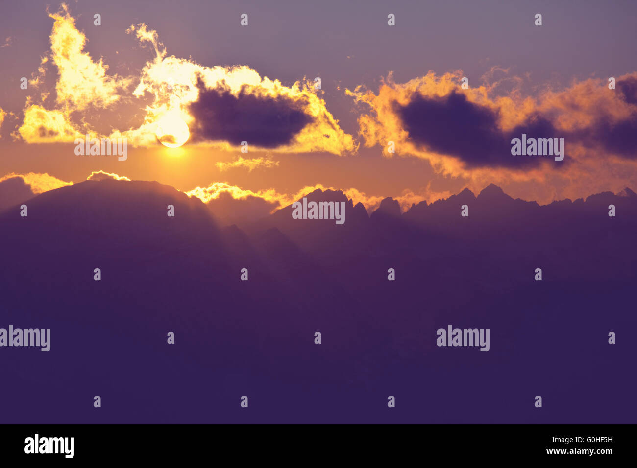 Mountains on sunset Stock Photo - Alamy