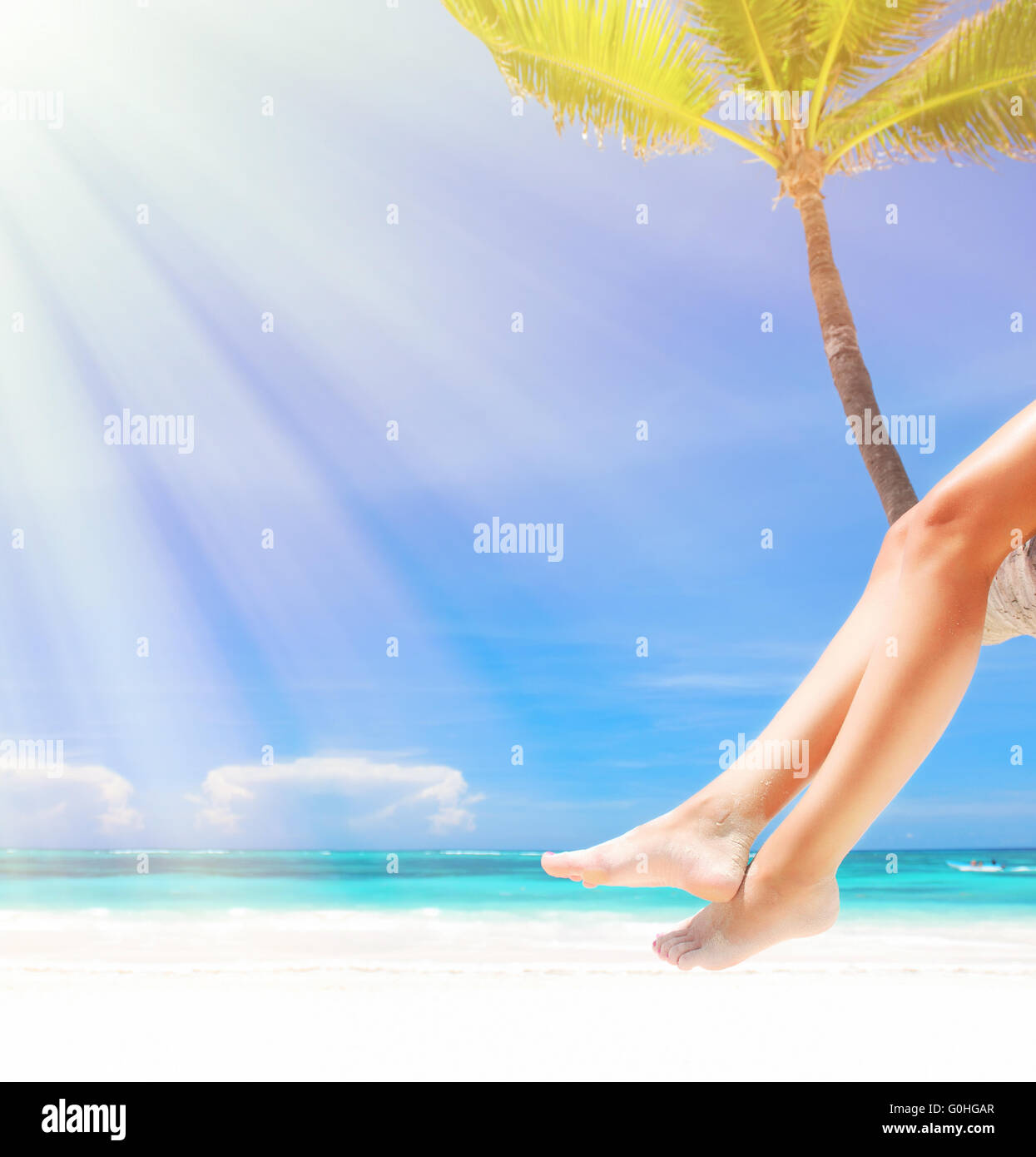 Woman on palm Stock Photo - Alamy
