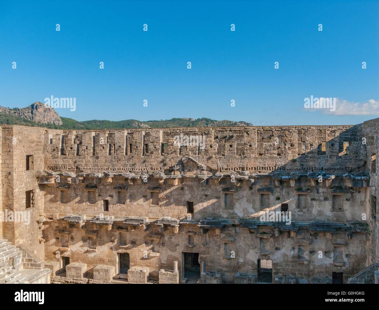 Roman theater of Aspendos - Complete exterior facade of the building ...