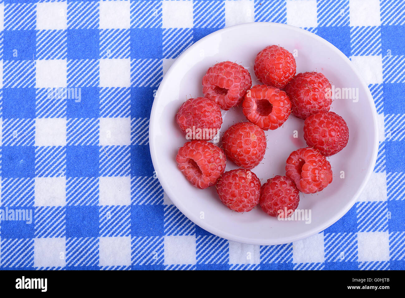 Big Pile of Fresh Raspberries in the White Bowl Stock Photo - Alamy