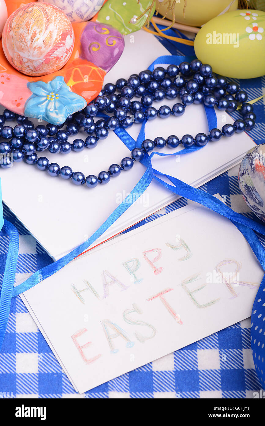 Easter eggs and invitation note. happy easter Stock Photo - Alamy