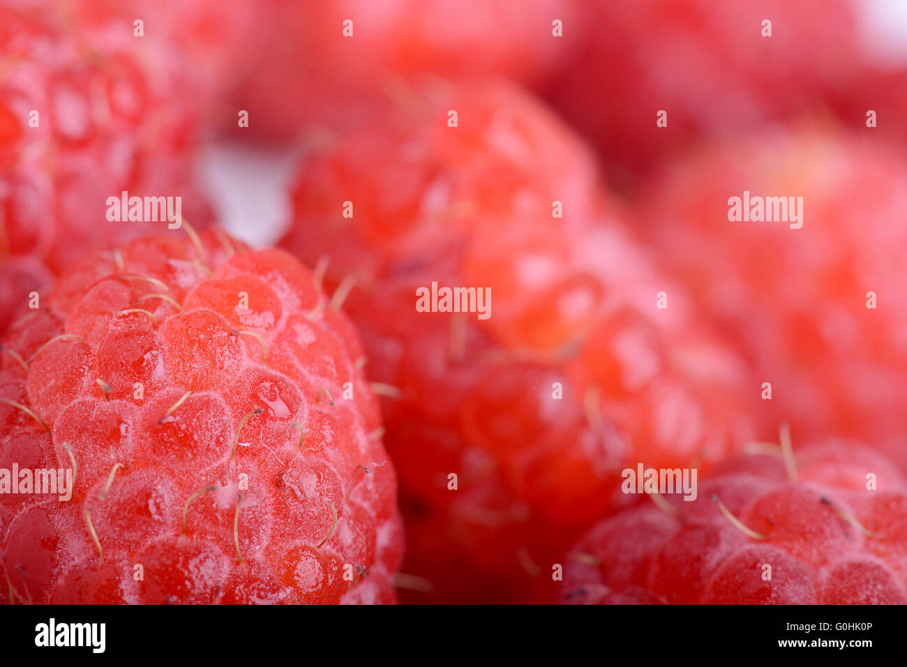 Fresh sweet raspberries close up Stock Photo - Alamy