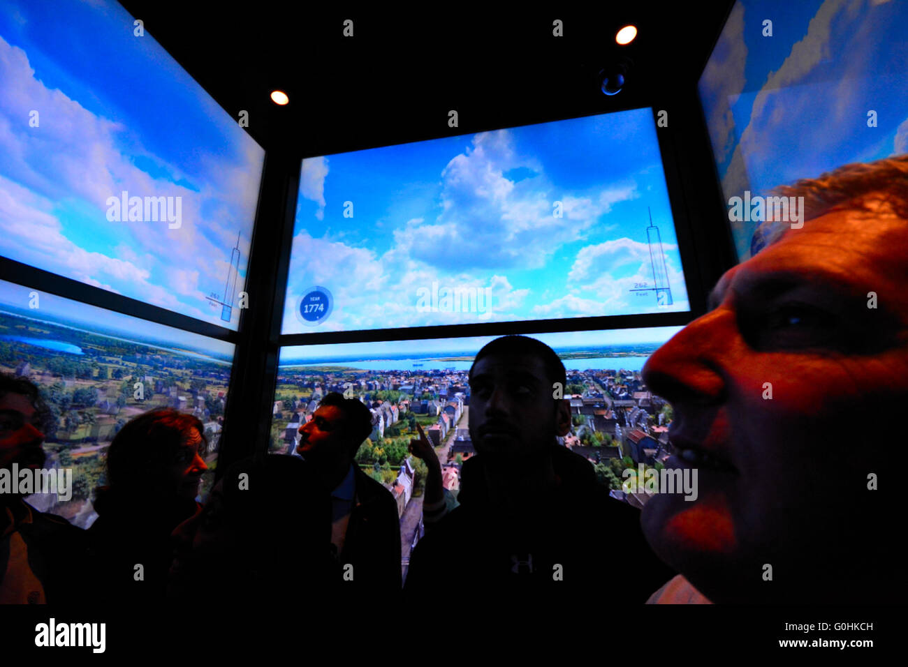 Riding the elevator which ascends to the observation deck of the ...