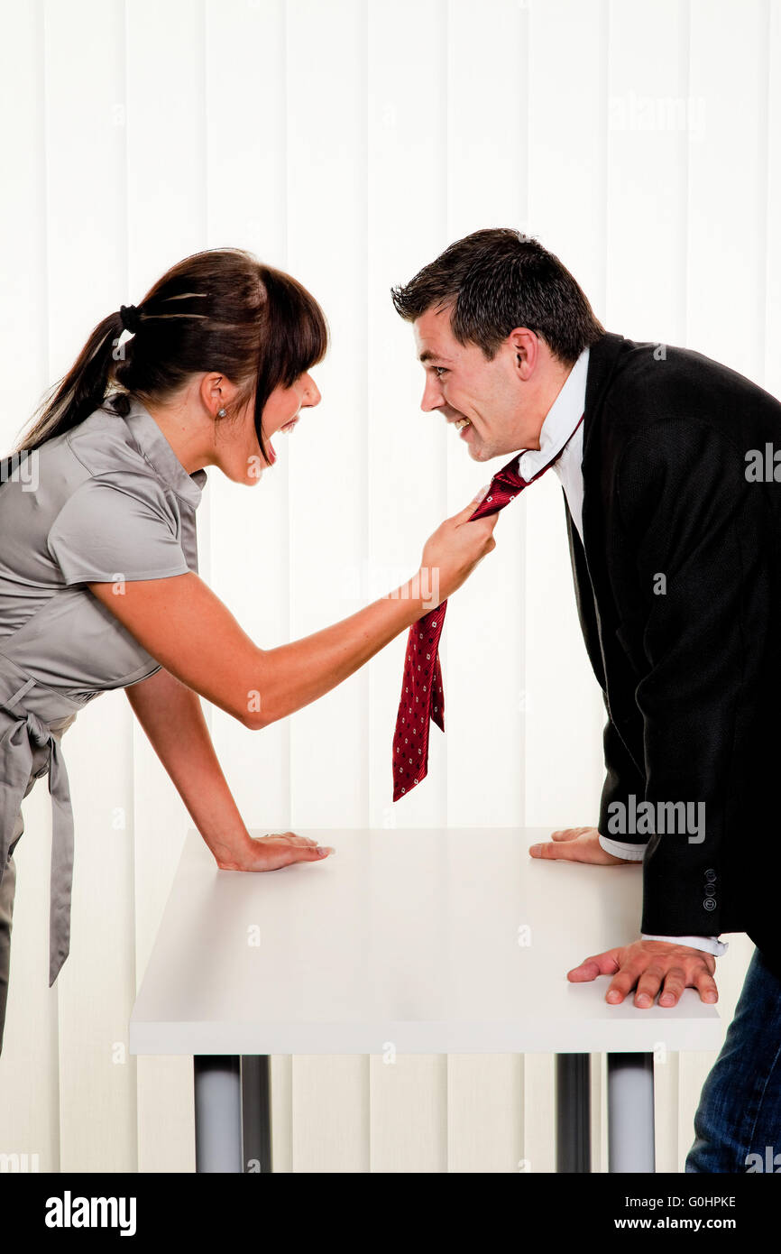 Dispute among employees at work in the office Stock Photo - Alamy