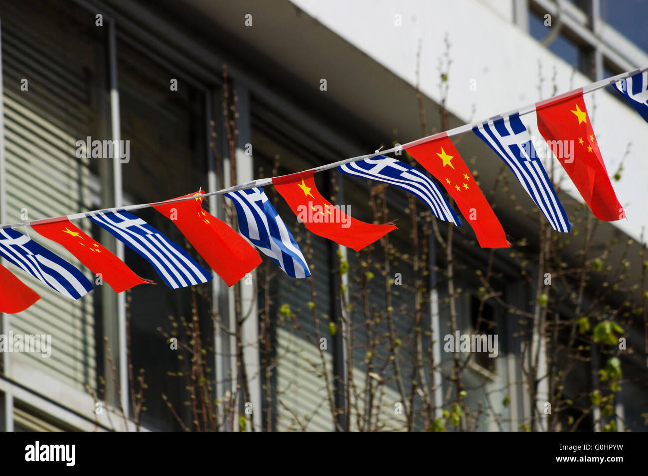 Greek and Chinese country flags serve as decorative elements waving in ...