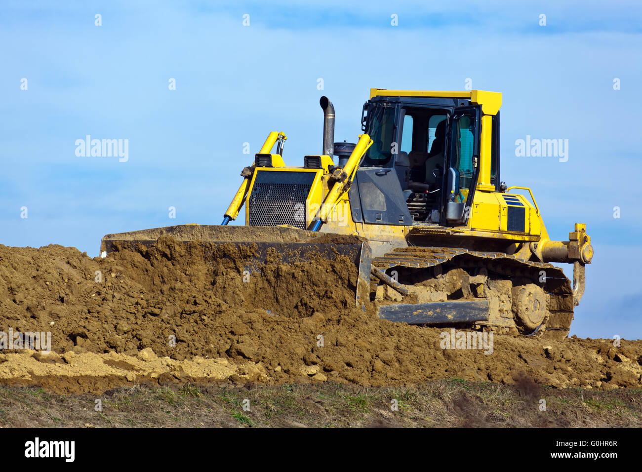 Excavator at construction work on site Stock Photo - Alamy