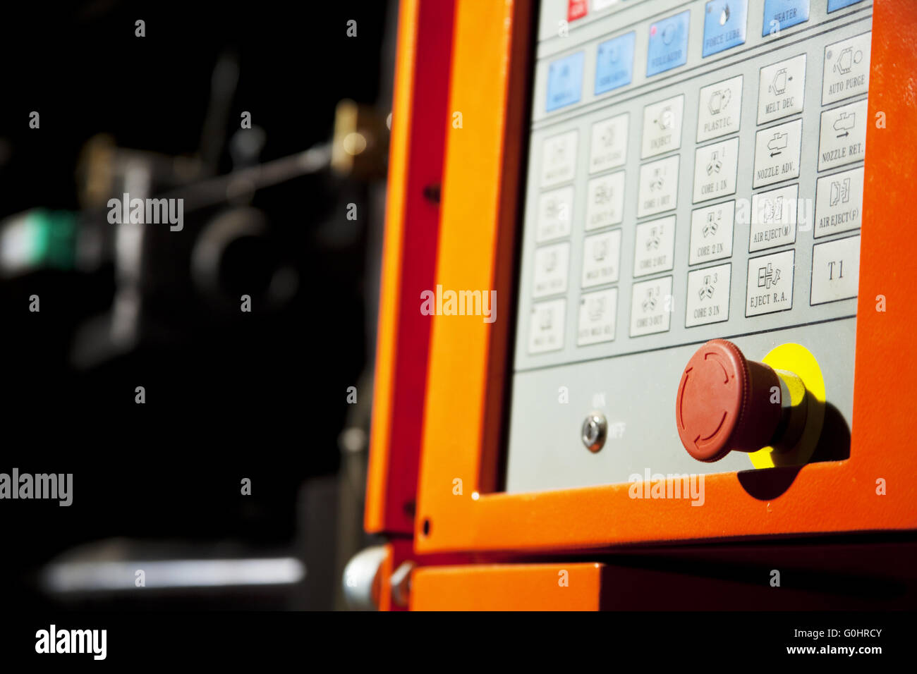 Complex machine control panel with big stop button Stock Photo - Alamy