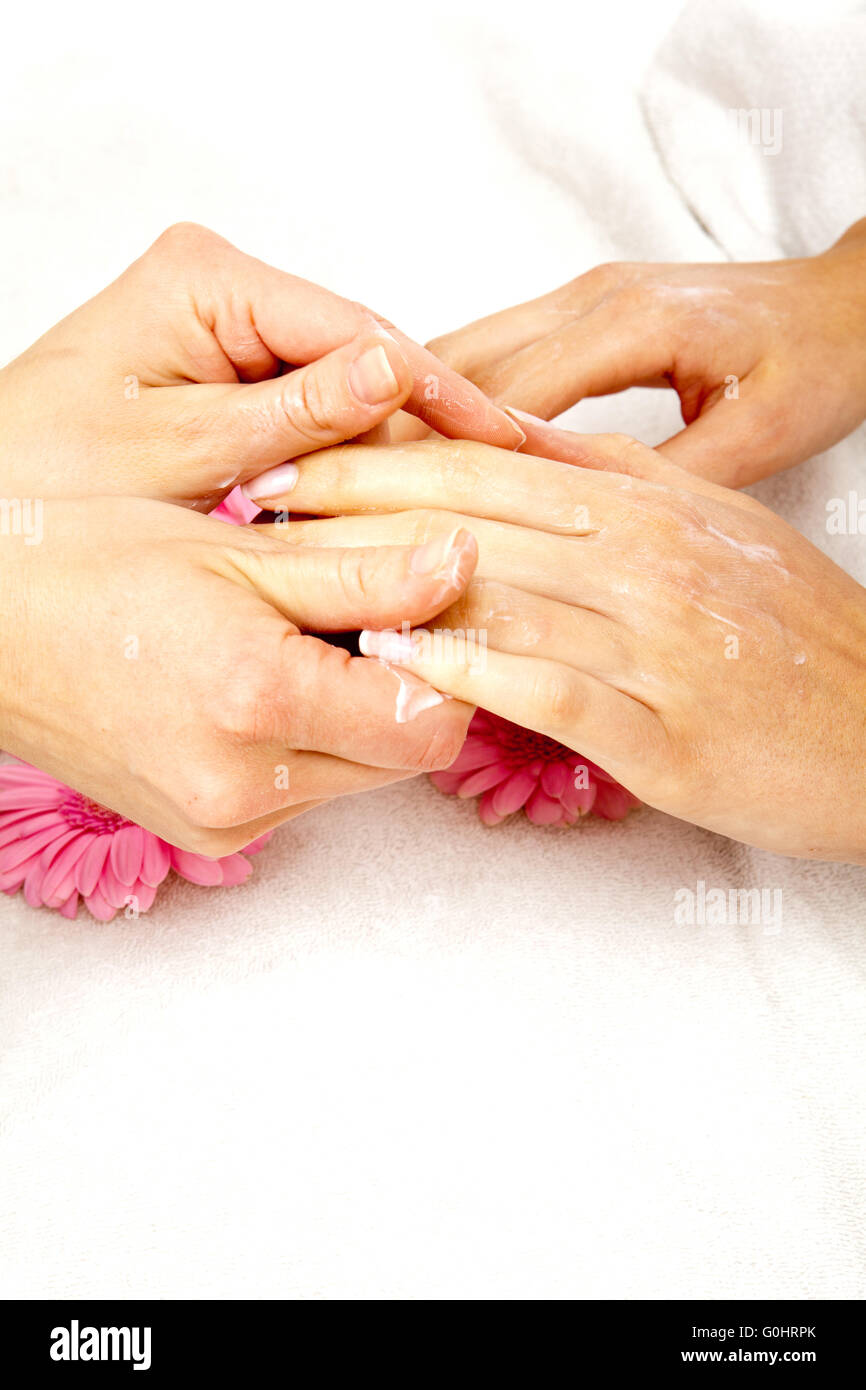 feminin hands with a treatment doing a manicure cl Stock Photo - Alamy