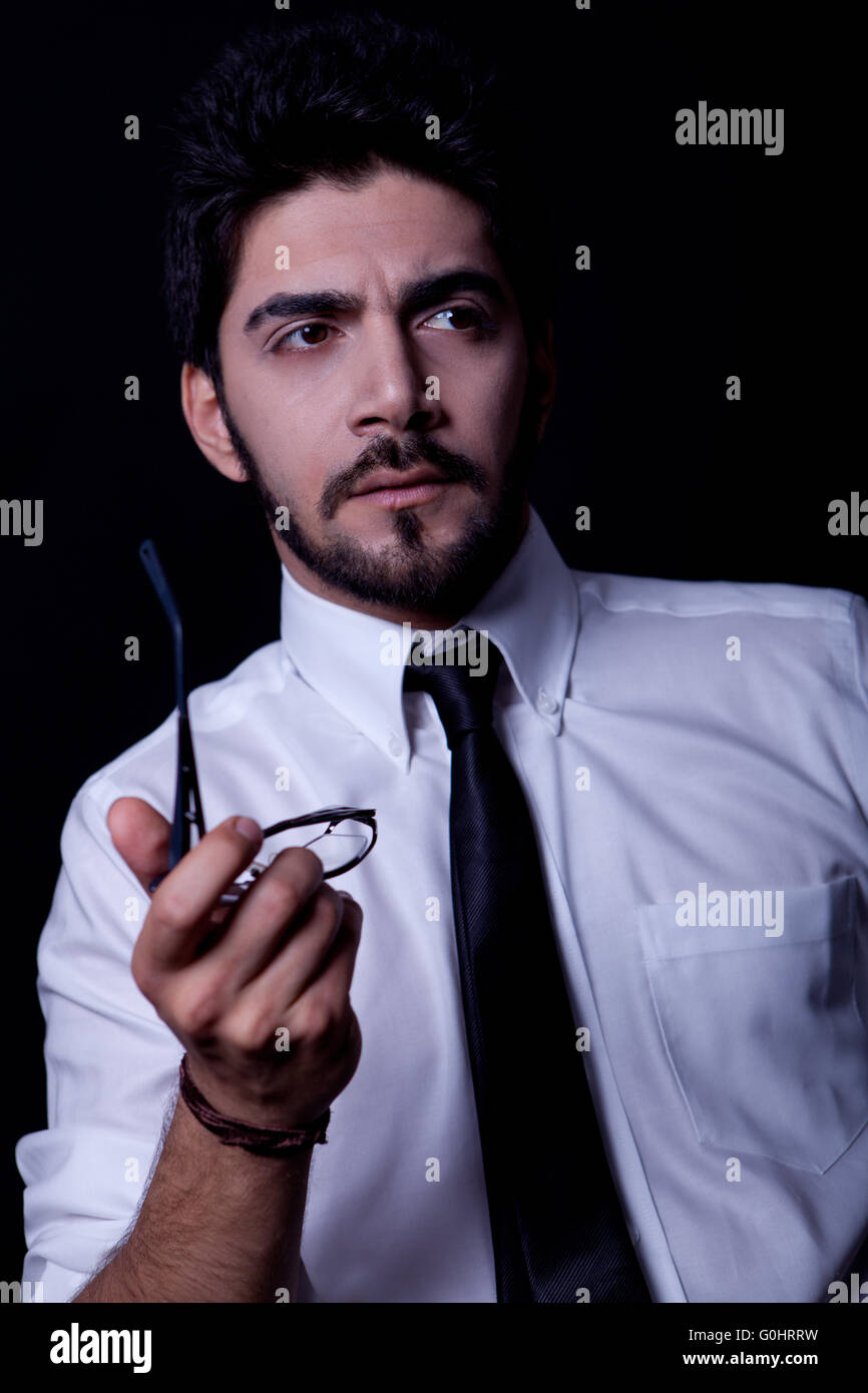 young successful business man with a suit isolated Stock Photo - Alamy