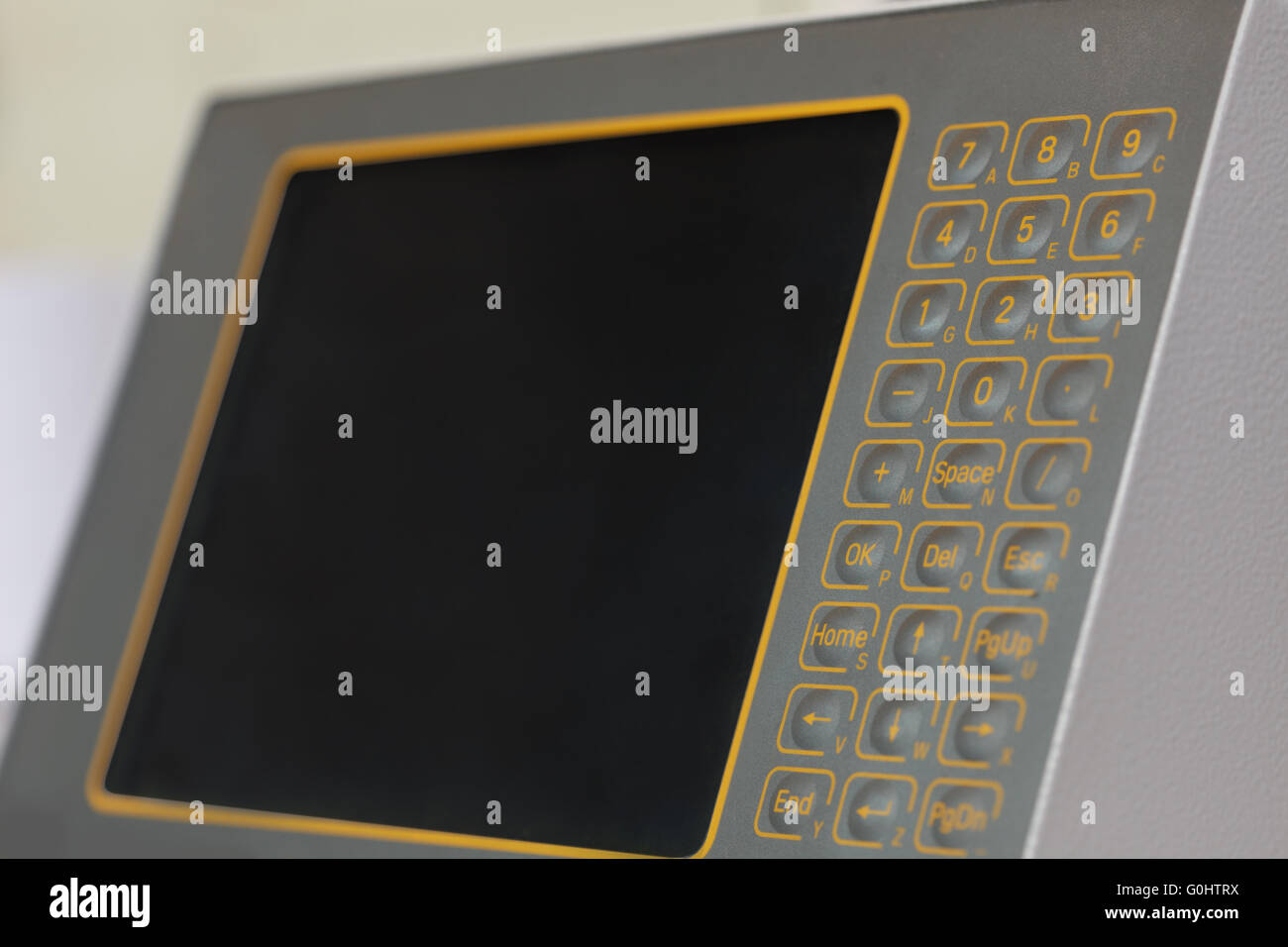 Monitor with touch-sensitive buttons on machine Stock Photo - Alamy