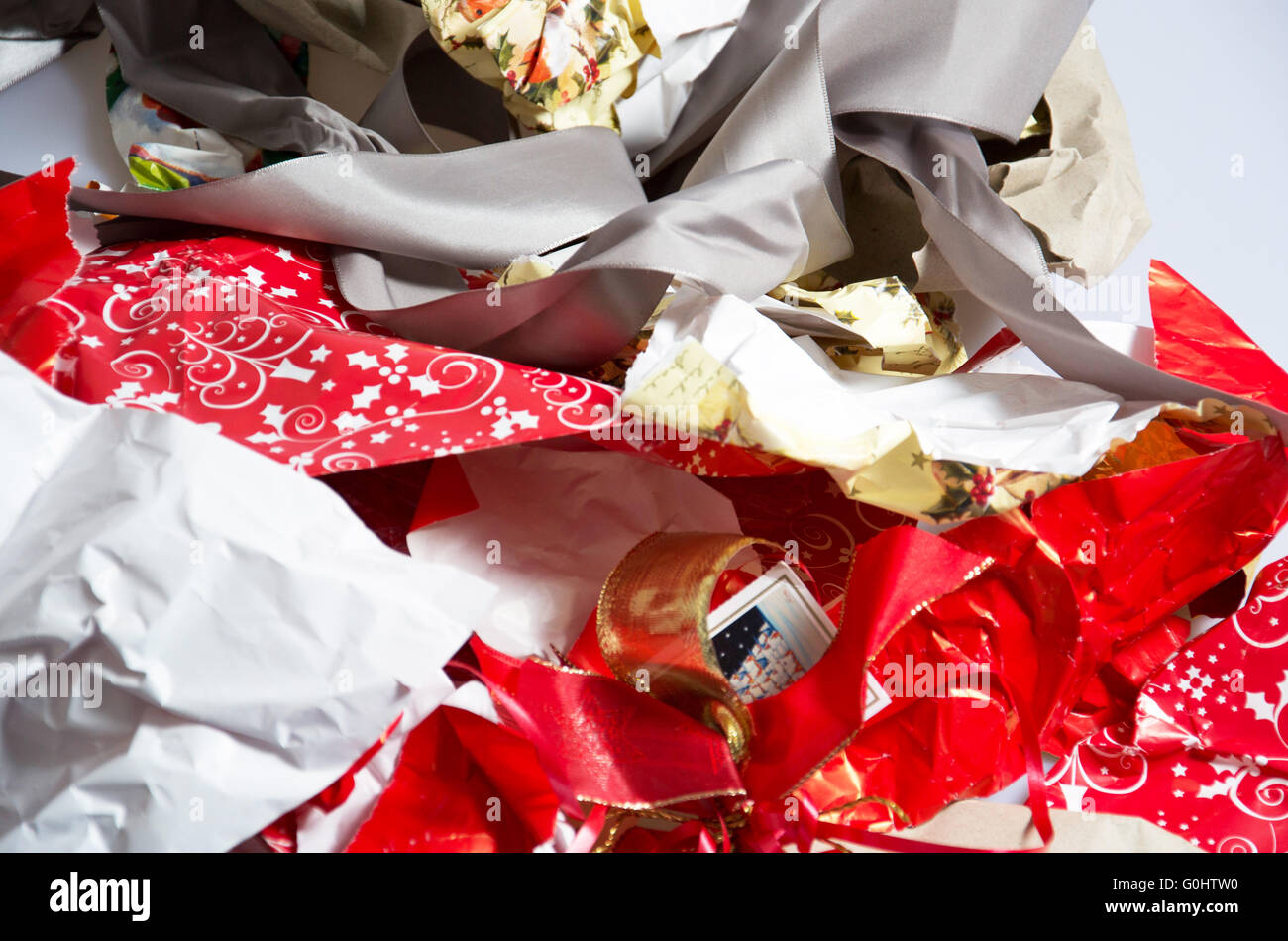 Mess christmas presents wrapping paper hi-res stock photography and ...