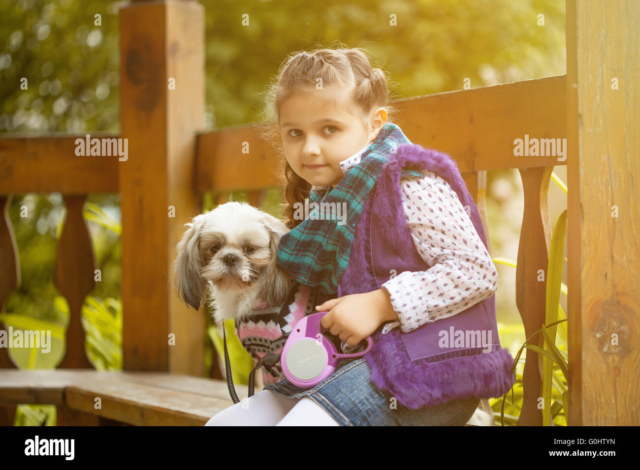 Image of pretty little girl posing with cute dog Stock Photo - Alamy