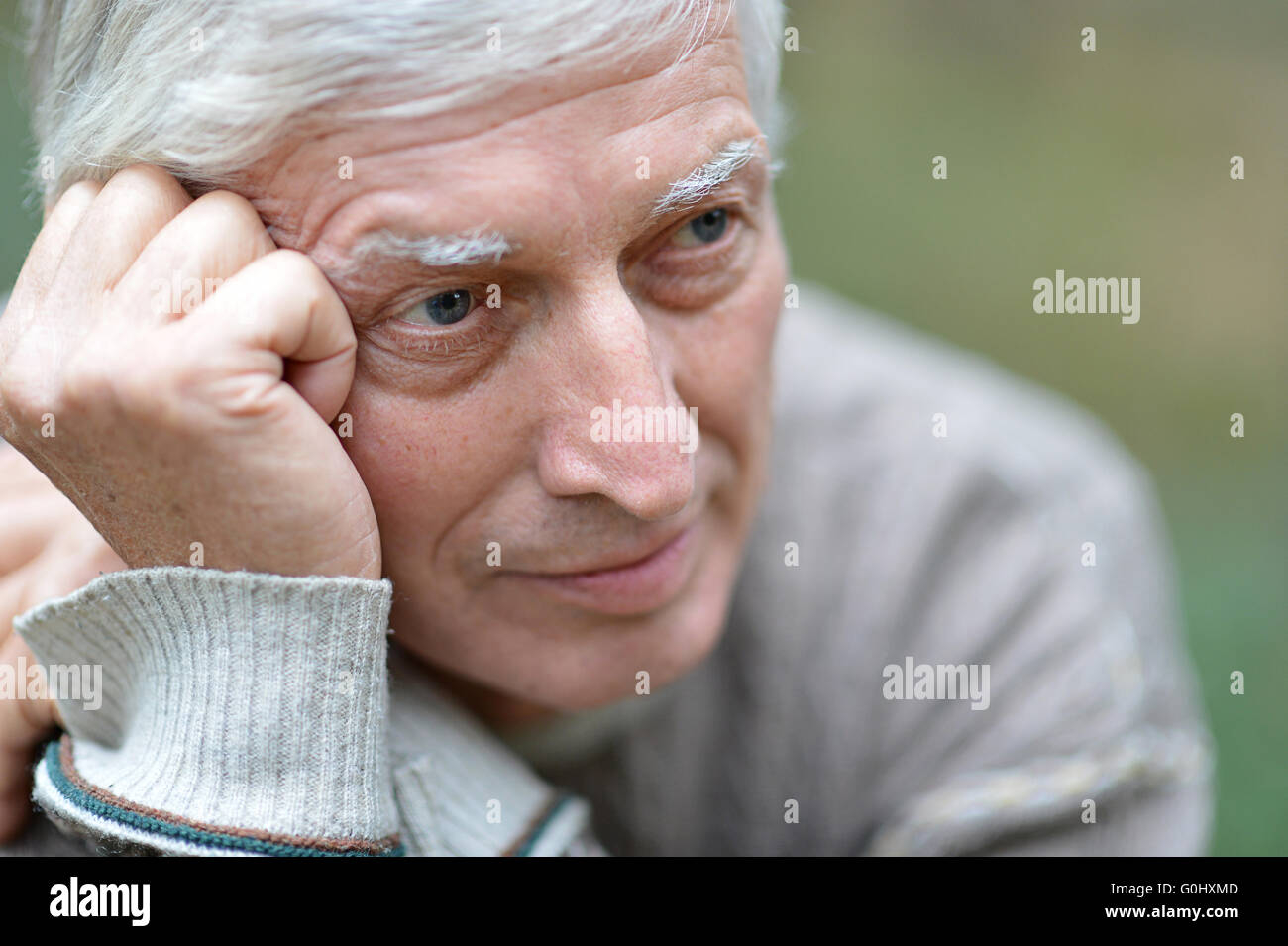 Senior man thinking Stock Photo - Alamy