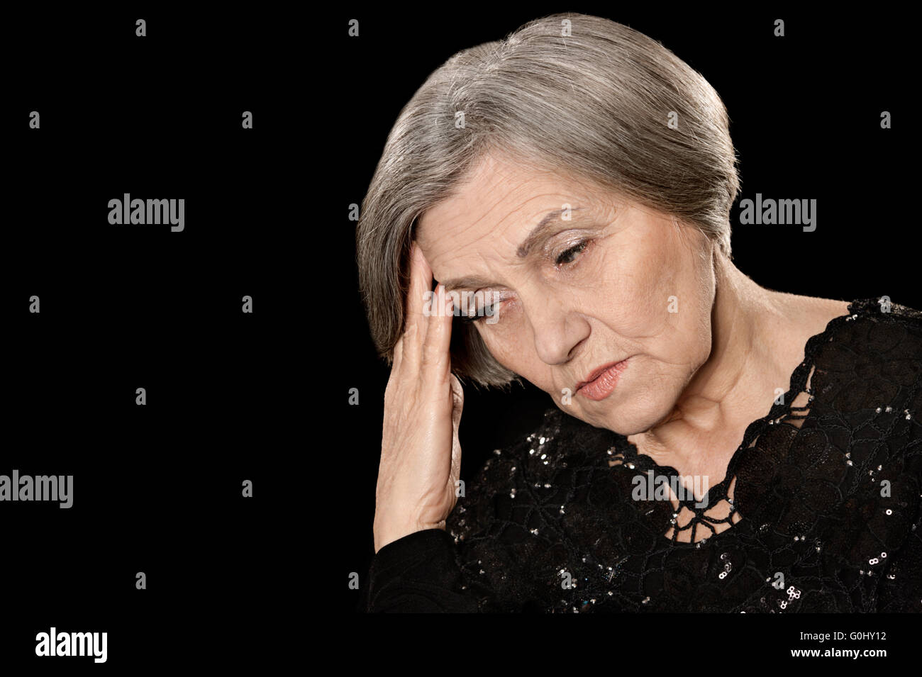 Sad senior woman Stock Photo - Alamy