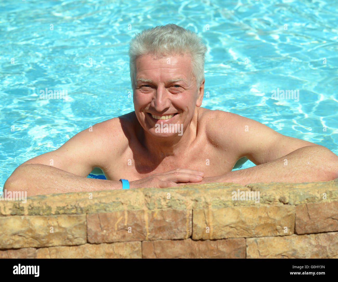 Man swimming pool elderly hi-res stock photography and images - Alamy