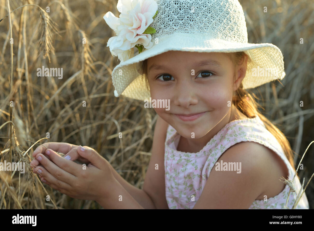 Cute little standing girl Stock Photo - Alamy