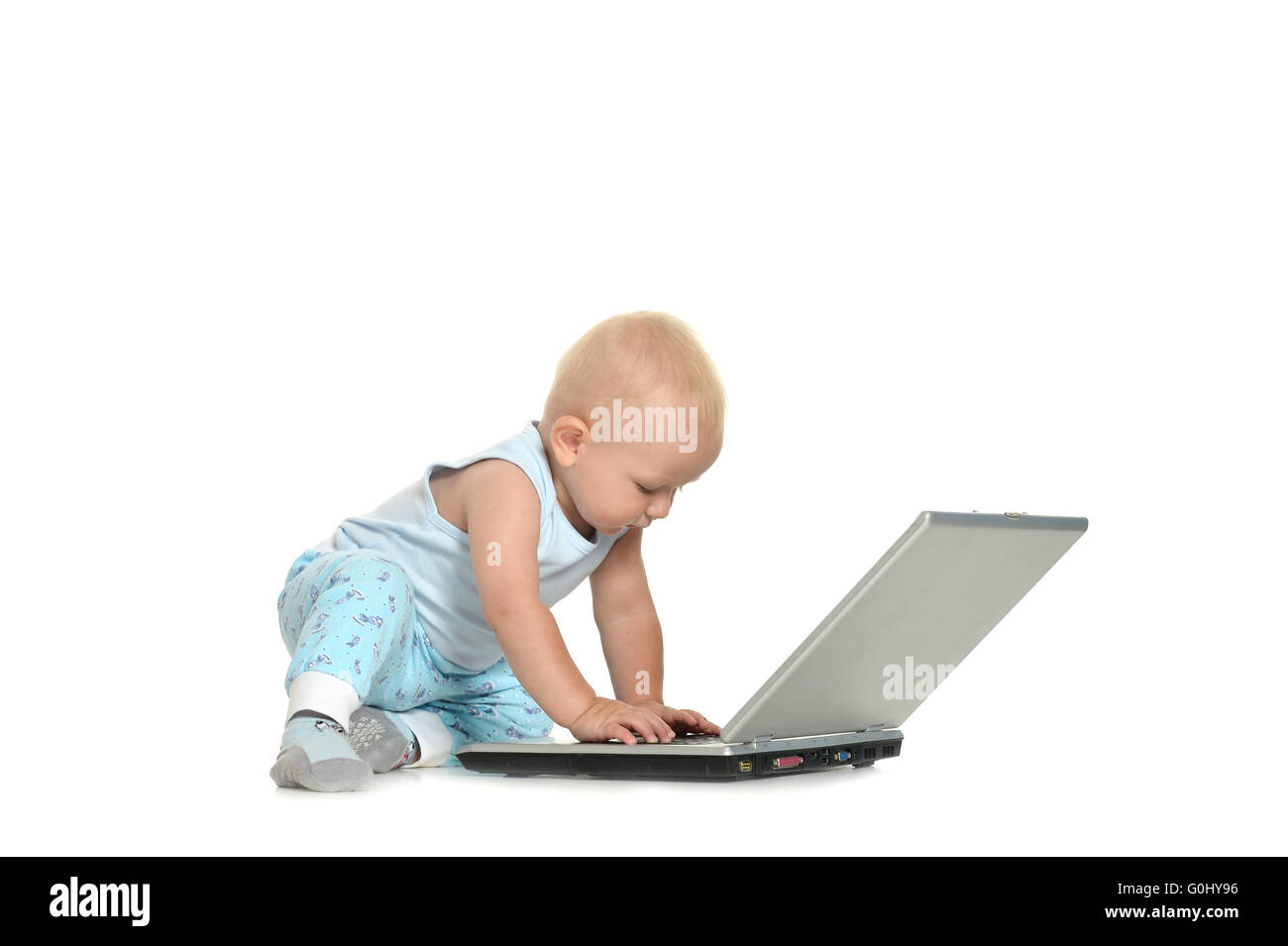 boy playing with laptop Stock Photo - Alamy