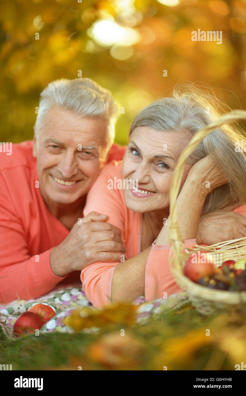 Couple in autumn park Stock Photo - Alamy