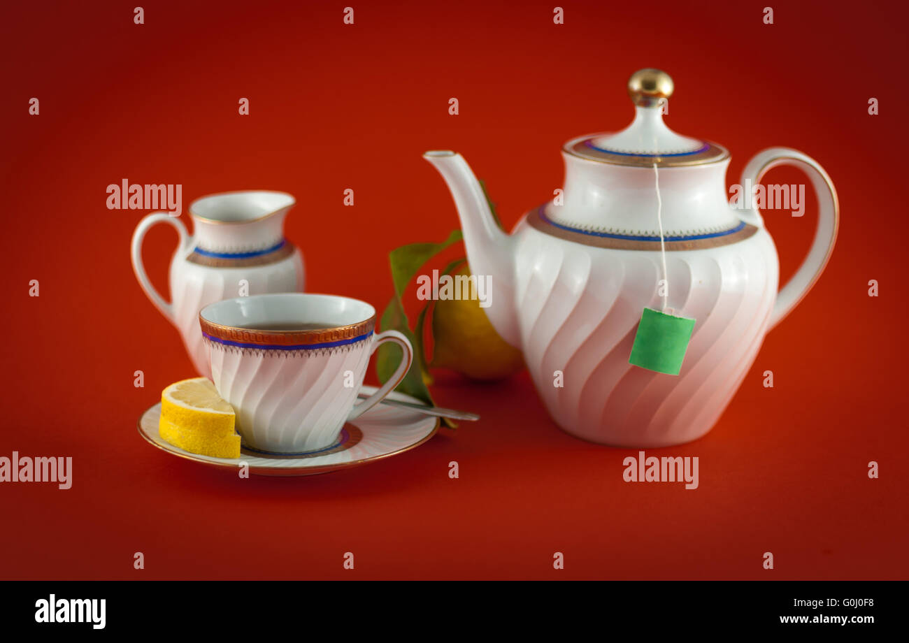 closeup of old tea service with cup, teapot,and milk jug Stock Photo ...