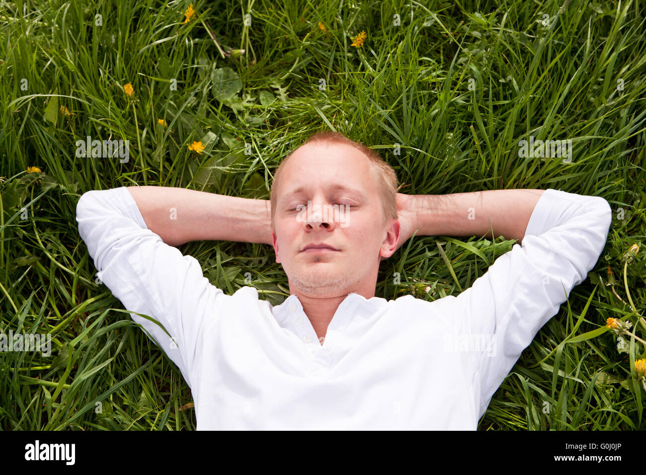 young man outdoor in summer in nature happy Stock Photo - Alamy