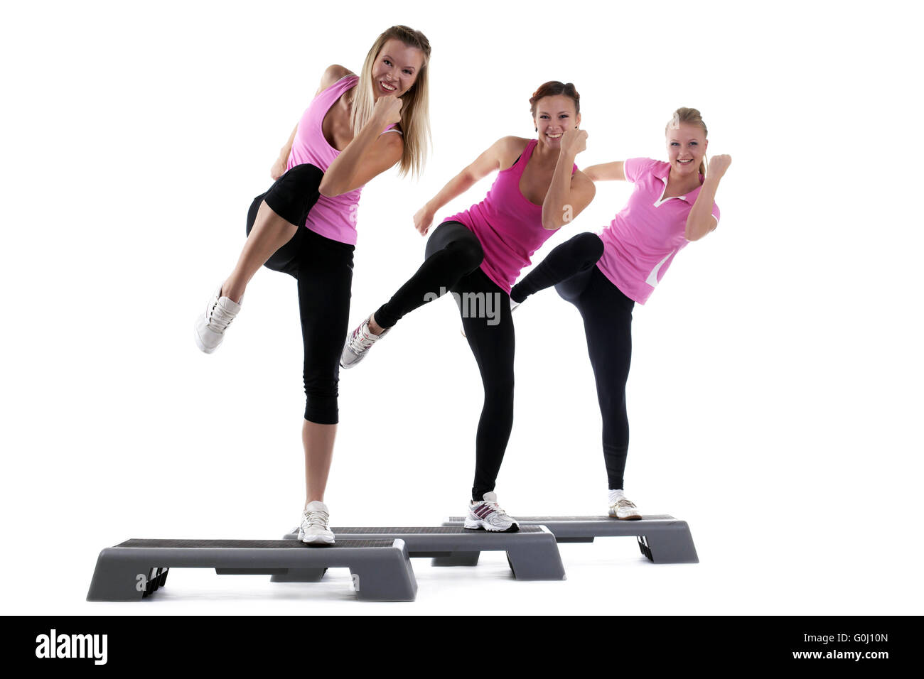 young group women training on stepper isolated Stock Photo - Alamy