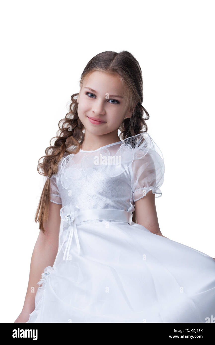 Pretty small kid portrait in white dress isolated Stock Photo - Alamy