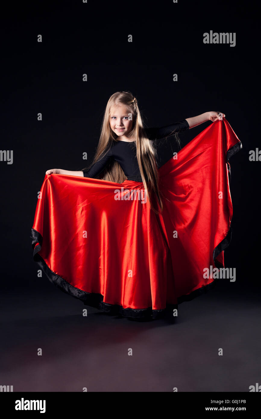 Girl in red performing hi-res stock photography and images - Alamy