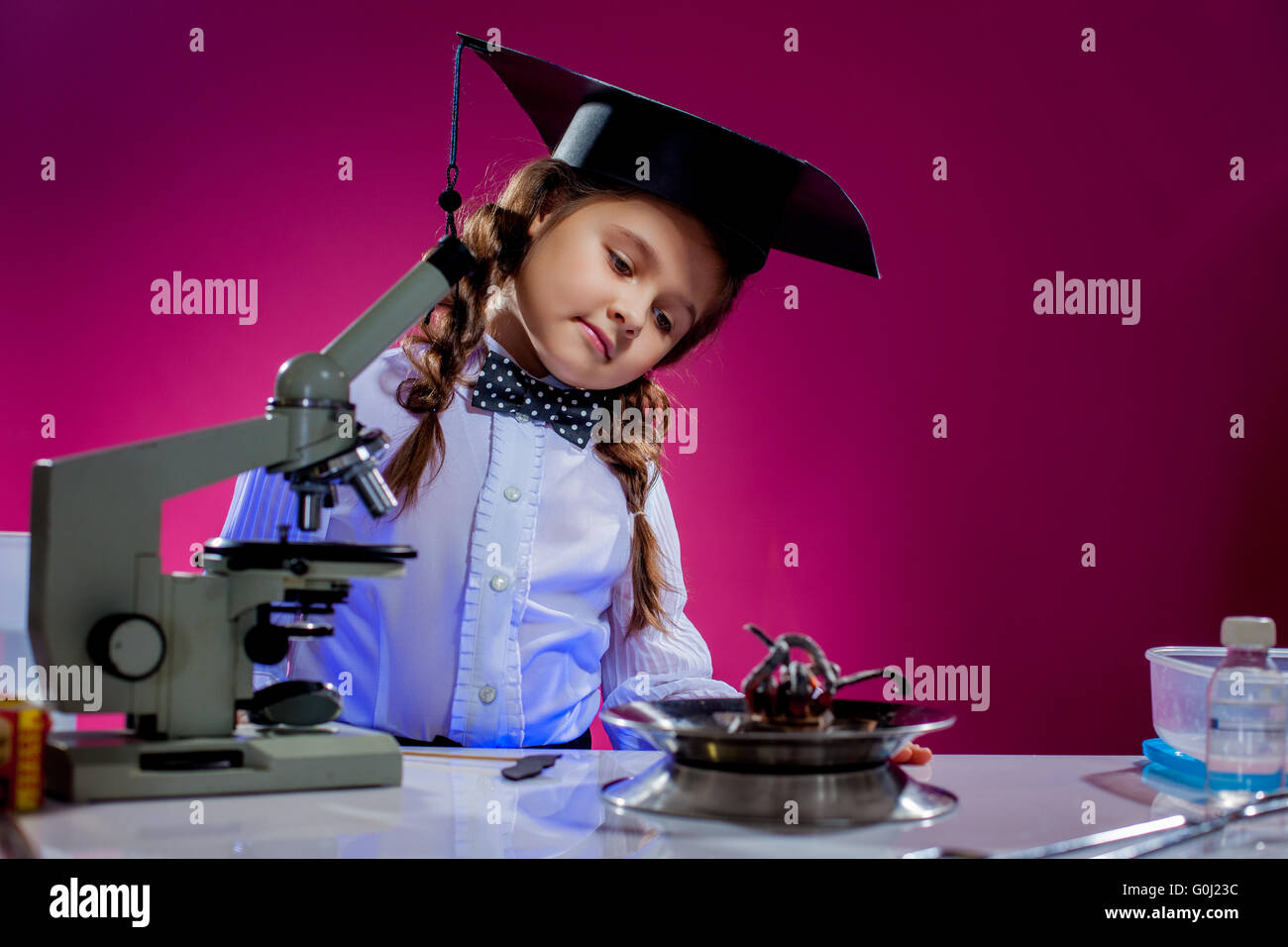 Portrait of curious girl posing in science lab Stock Photo - Alamy