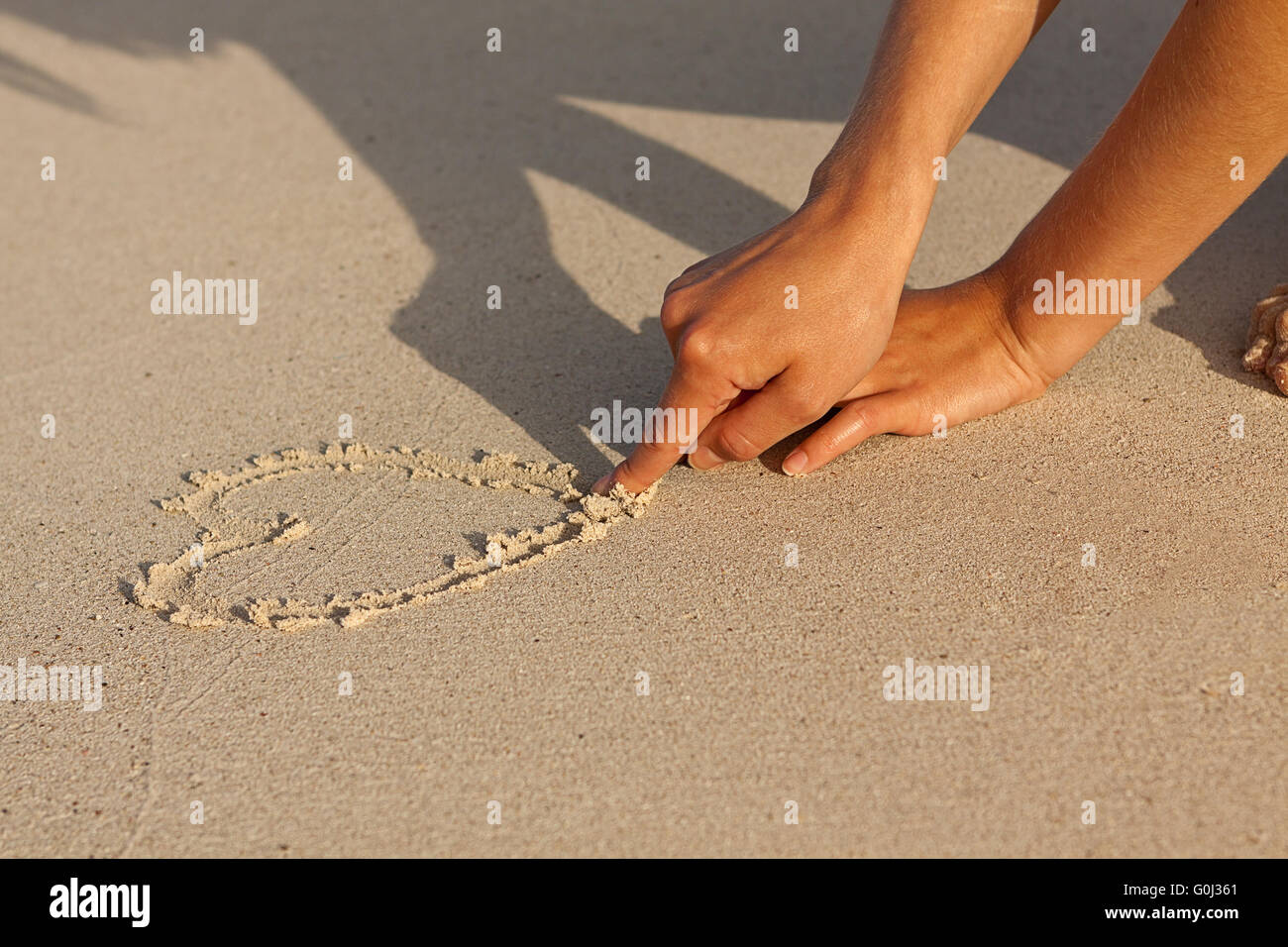 hand writing in sand in summer holidays on beach Stock Photo - Alamy