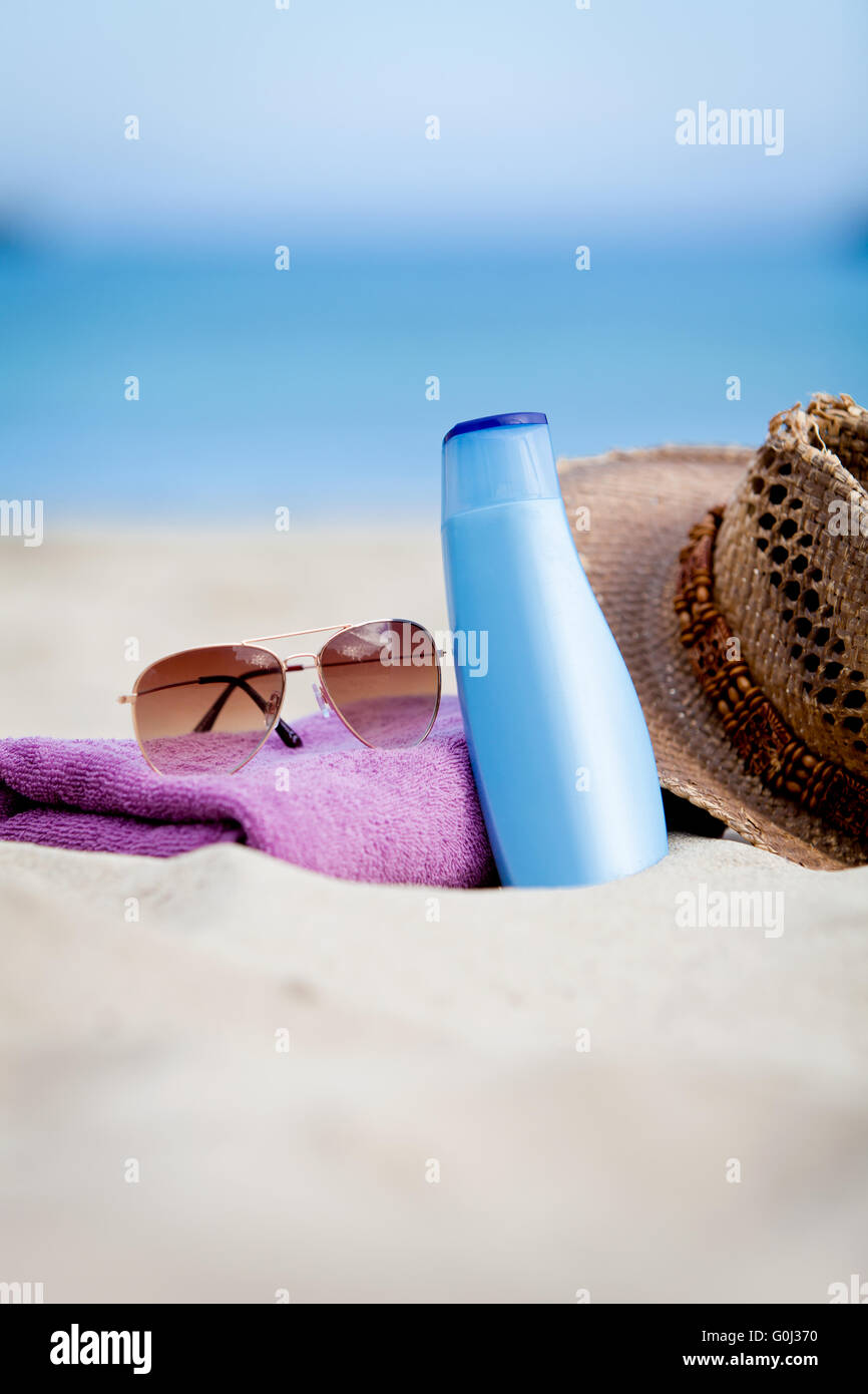sunprotection objects on the beach in holiday Stock Photo - Alamy